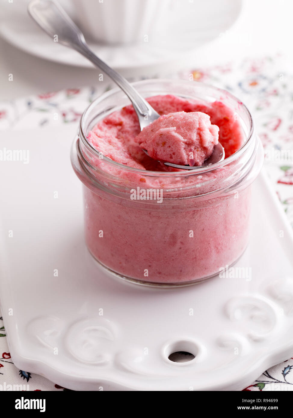 Raspberry agar mousse and tea Stock Photo - Alamy