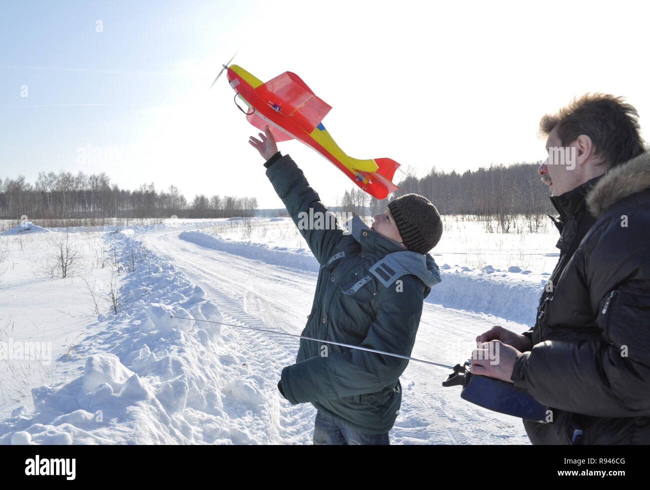 Kovrov, Russia. 19 February 2012. Teen and mentor model airplane ...