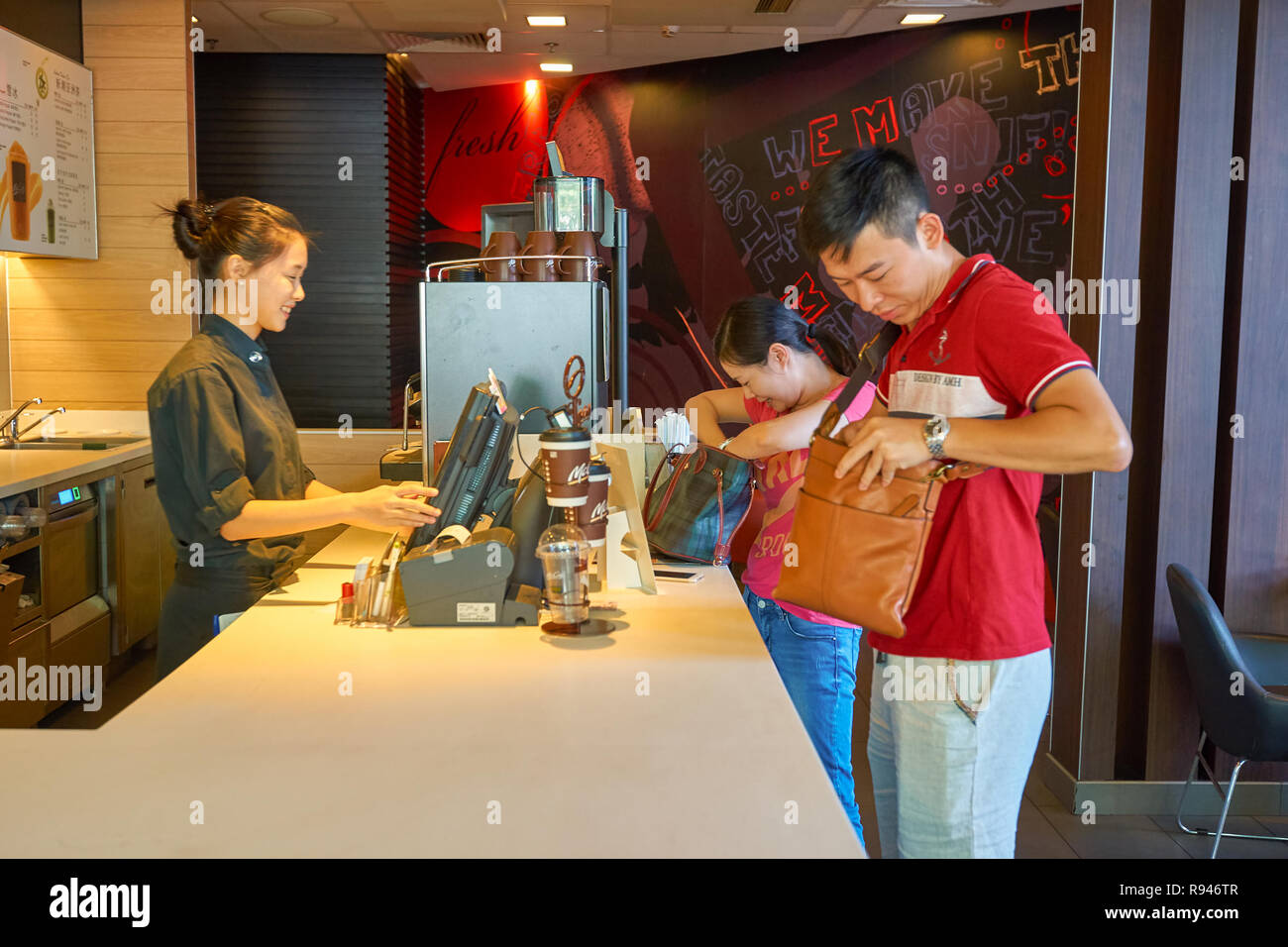 SHENZHEN, CHINA - CIRCA OCTOBER, 2015: people buy coffee at McCafe ...