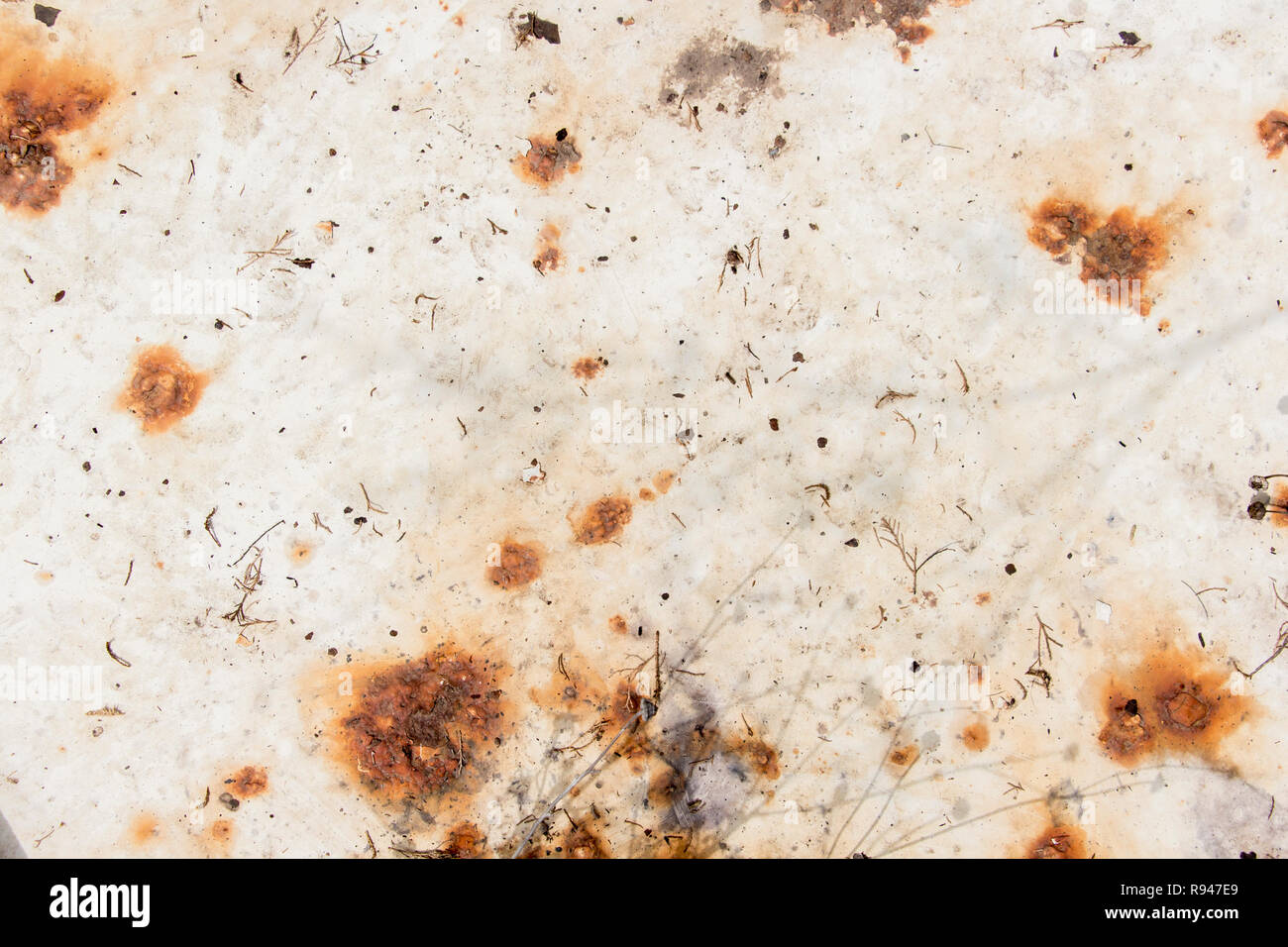 rusty white metal background, white metal plate with traces of rust ...