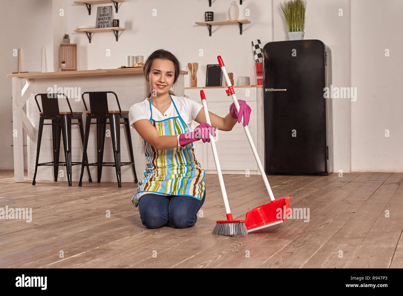Sweeping mopping floor kitchen hi-res stock photography and images - Alamy