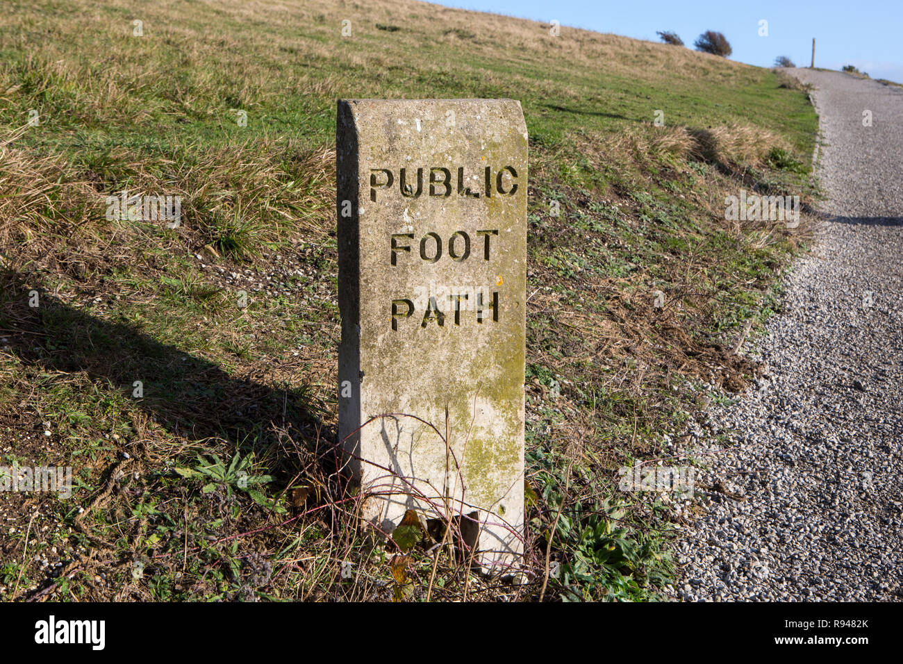 A stone Public Footpath sign Stock Photo - Alamy