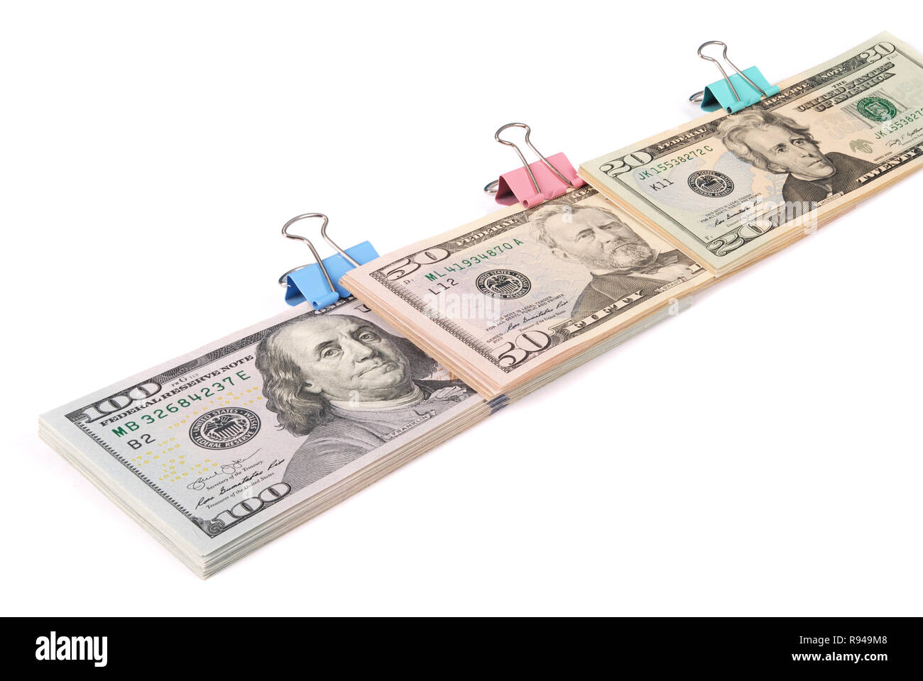 Three wads of money one hundred fifty and twenty dollars isolated on ...