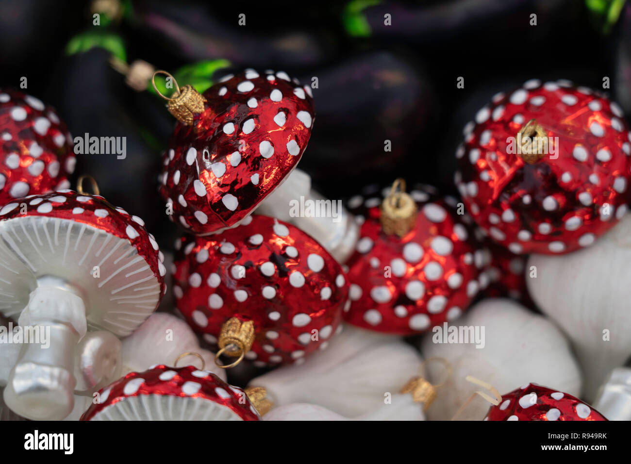 Ornamental red Toadstools with white spots on display Stock Photo - Alamy