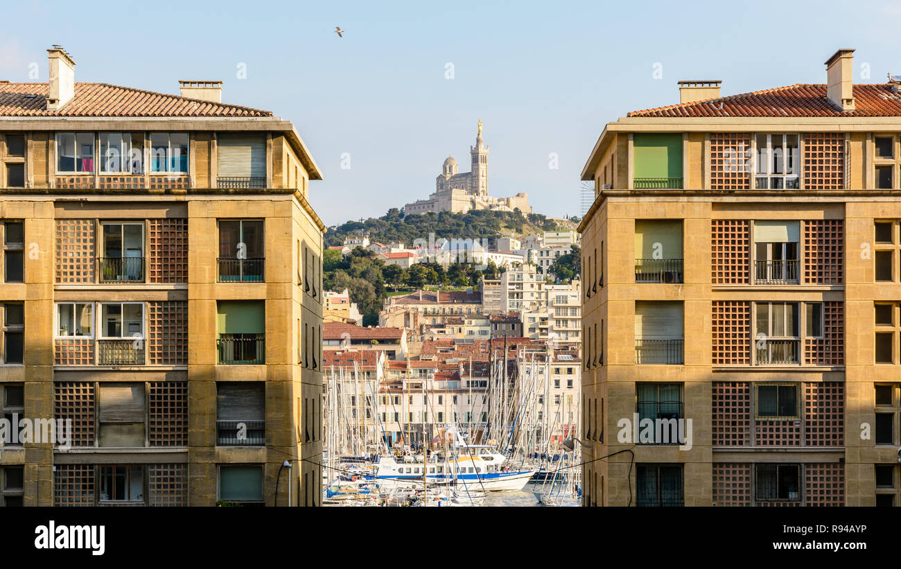 The Old Port of Marseille, France, seen between residential buildings ...