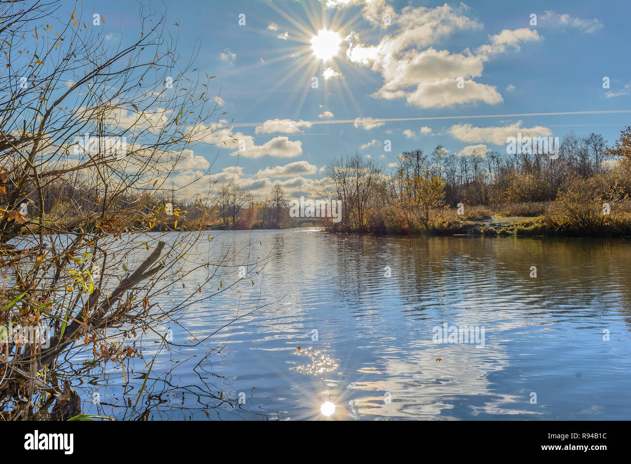 Reflection Of The Sun In The River Stock Photo - Alamy