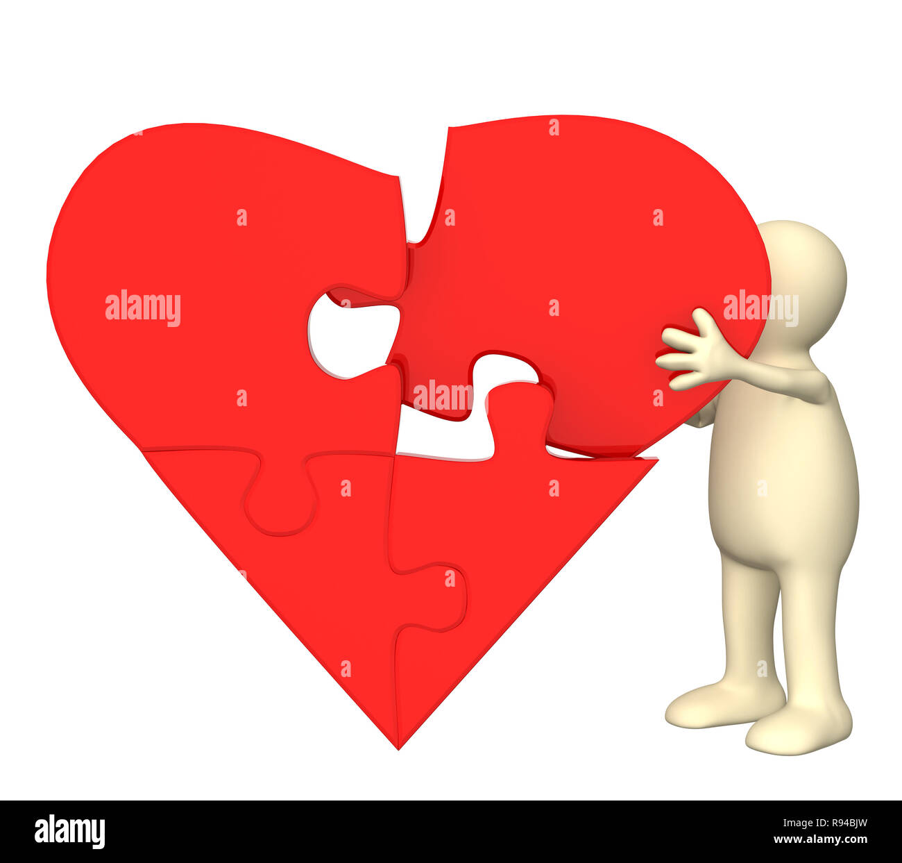Symbol of love - heart from parts of a puzzle Stock Photo - Alamy