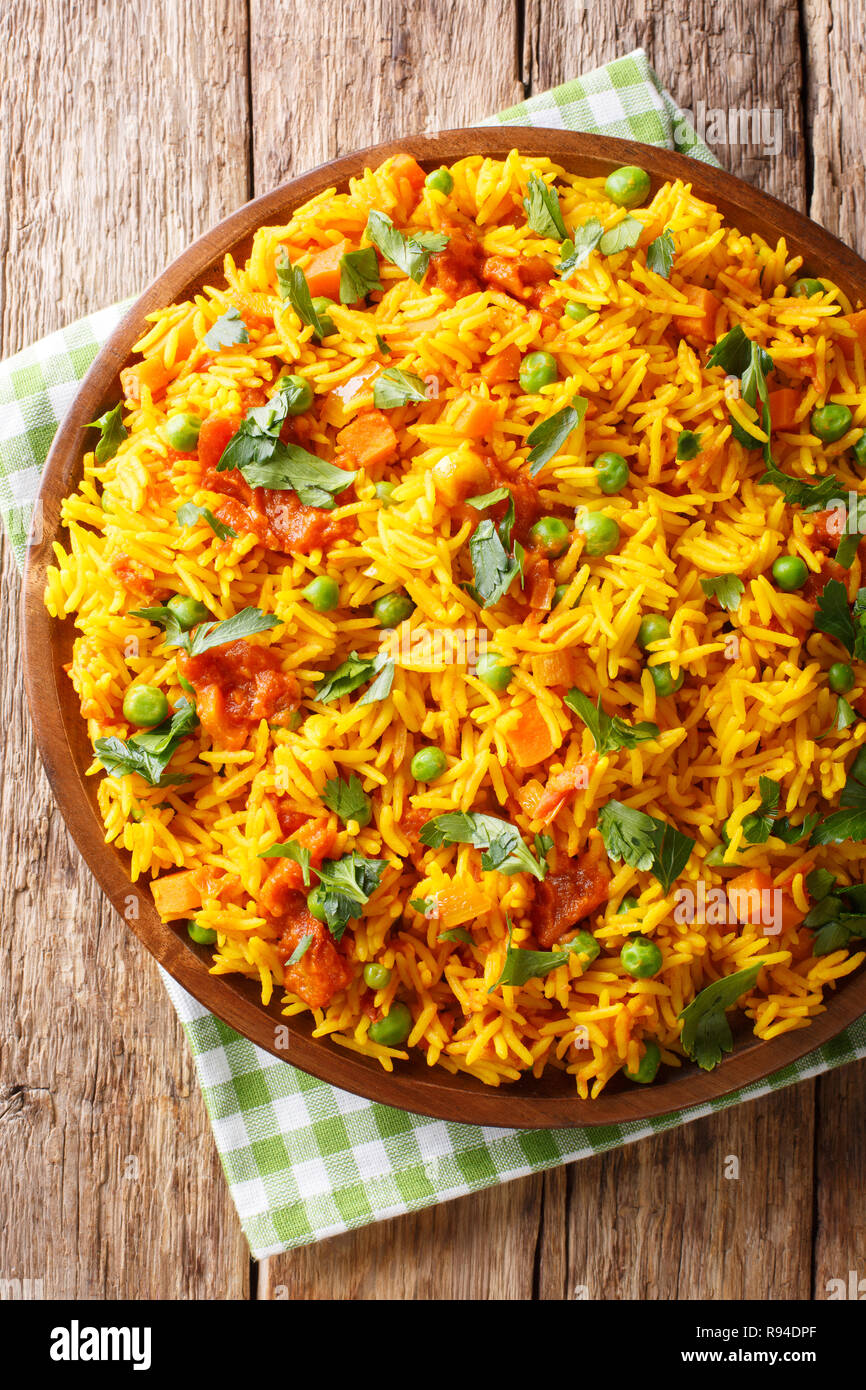 Tawa Pulao is a popular Mumbai street food of rice with vegetables and ...
