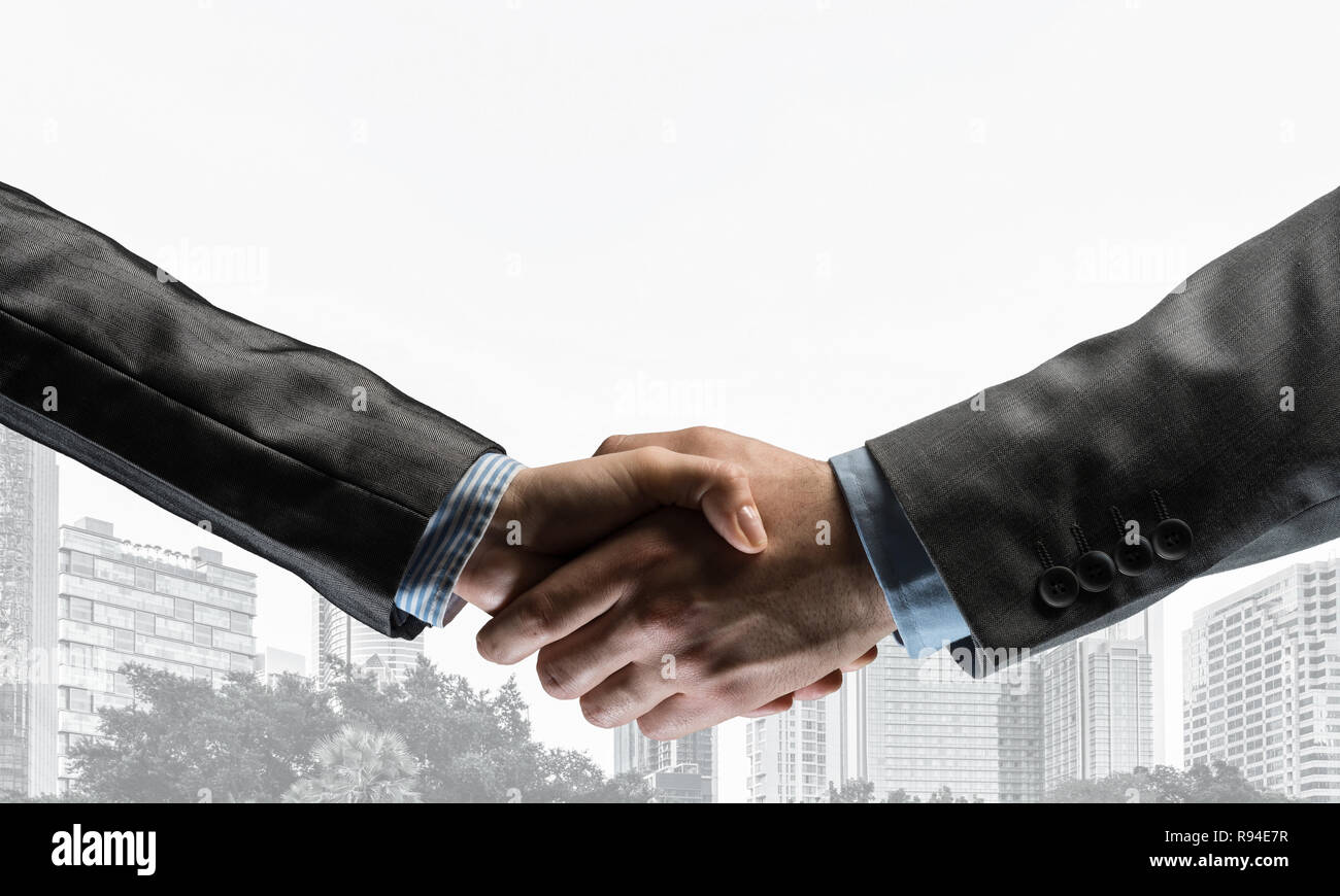 Business handshake as idea for unity and cooperation or greeting Stock ...