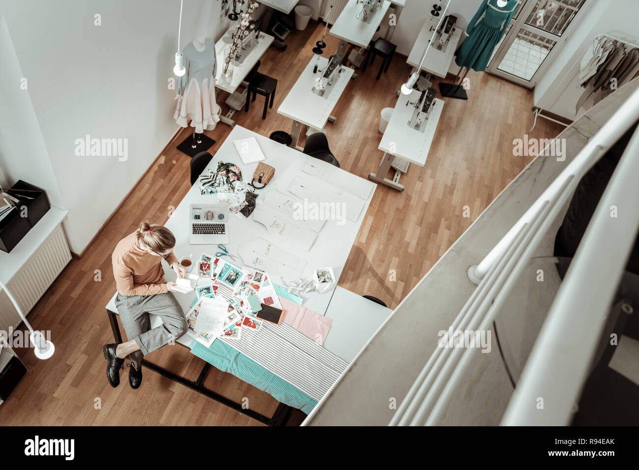 Young tall professional designer from generation Y working in a ...