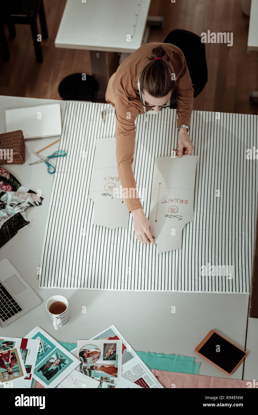 Fashion designer working sewing patterns hi-res stock photography and ...