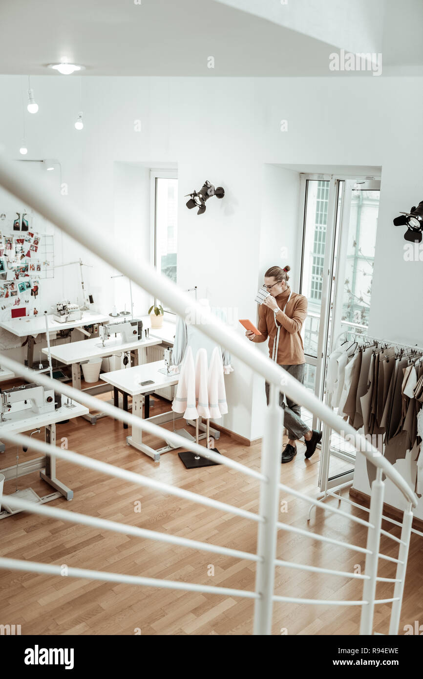 Handsome young fashion designer form generation Y looking relaxed Stock ...