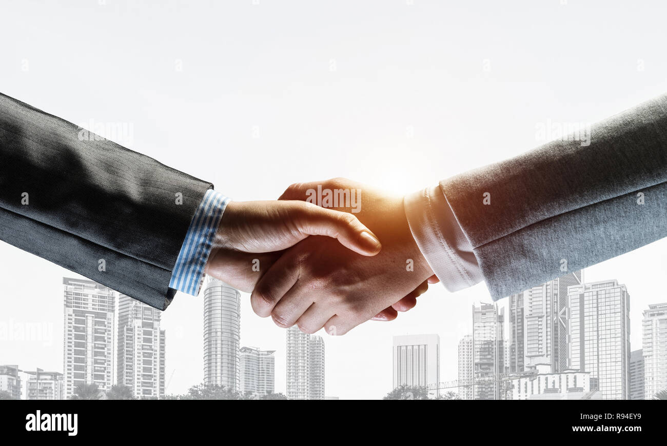 Business handshake as idea for unity and cooperation or greeting Stock ...
