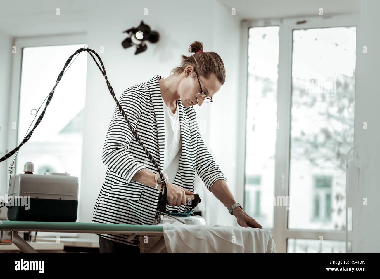 Handsome attentive young man hi-res stock photography and images - Alamy