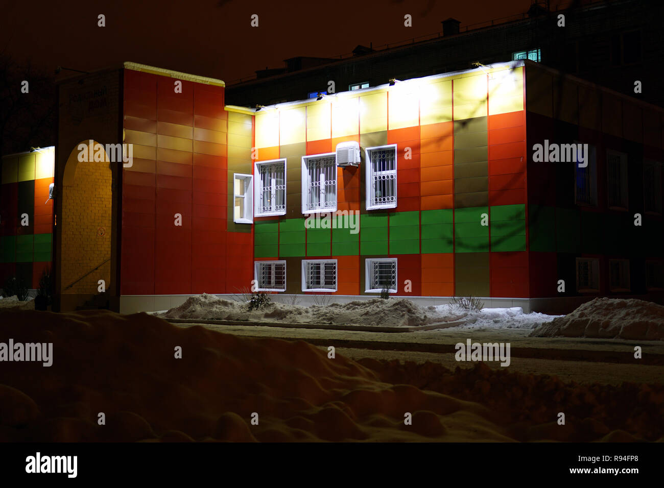 Illuminated hospital building in different colours in the night Stock ...