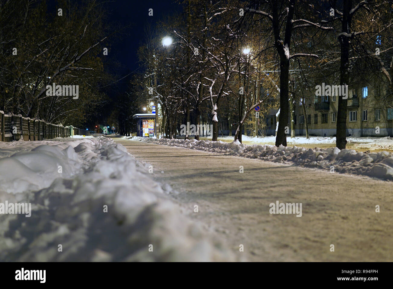 City streets view in snowy winter night Stock Photo - Alamy