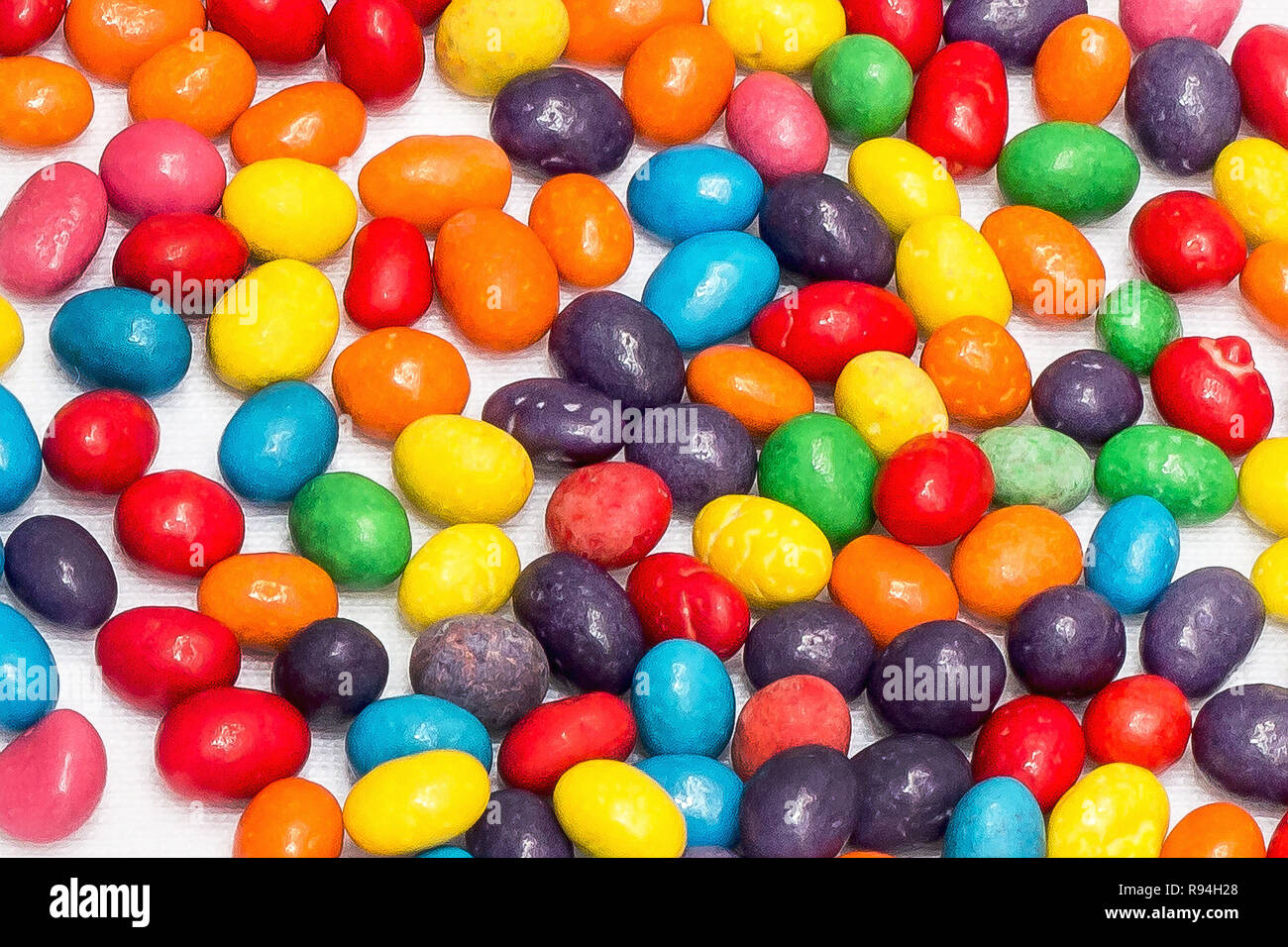 colorful candy scattered isolated with white background Stock Photo - Alamy
