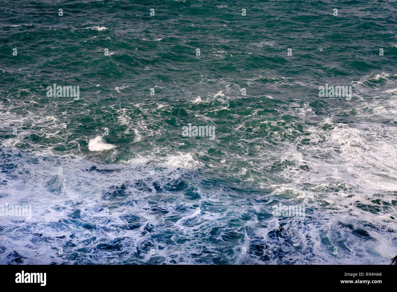 Rough sea background with breaking waves Stock Photo - Alamy