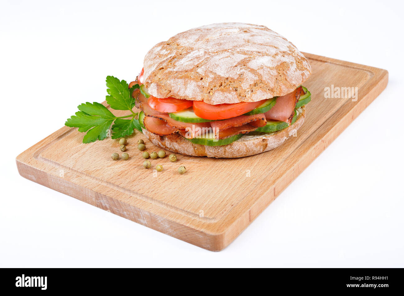 Tyrolean rye flat bread with smoked bacon and cheese Stock Photo - Alamy