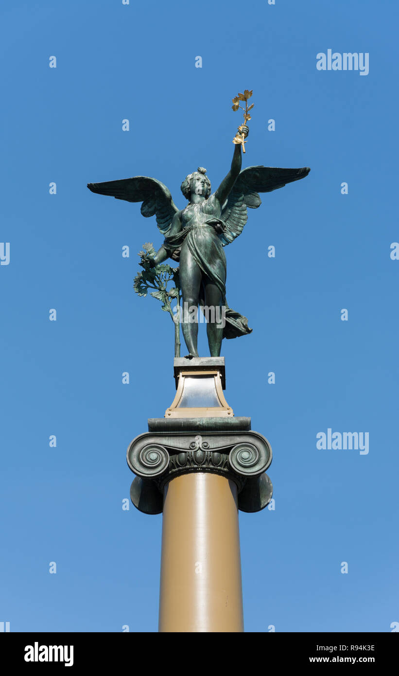Angel holding a branch at the Czech Bridge entrance column, Prague ...