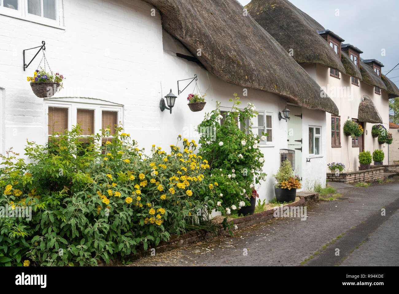A thatch-roofed building in a village near Salisbury, Wiltshire ...