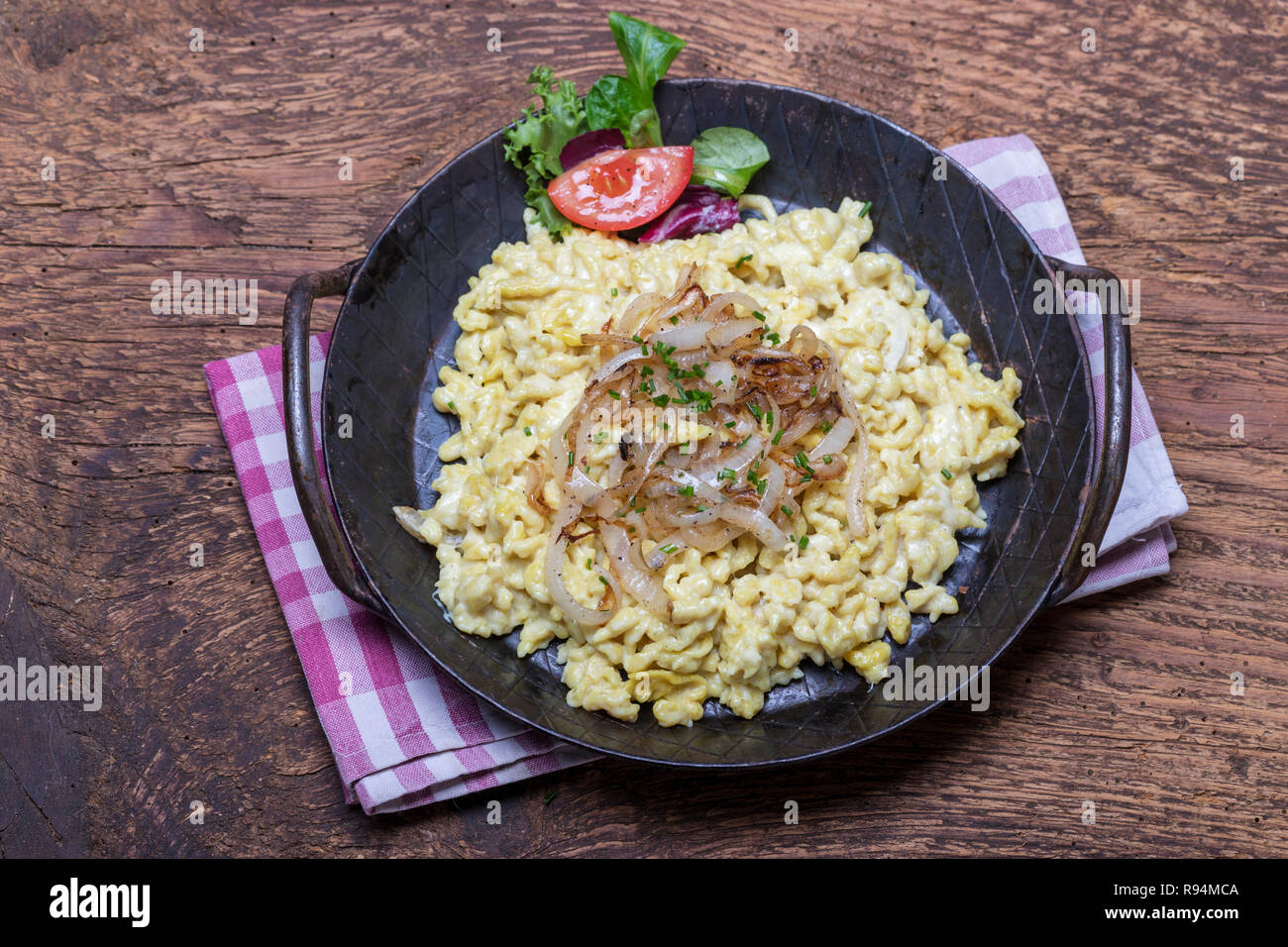 Closeup of bavarian kaes spaetzle on wood hi-res stock photography and ...