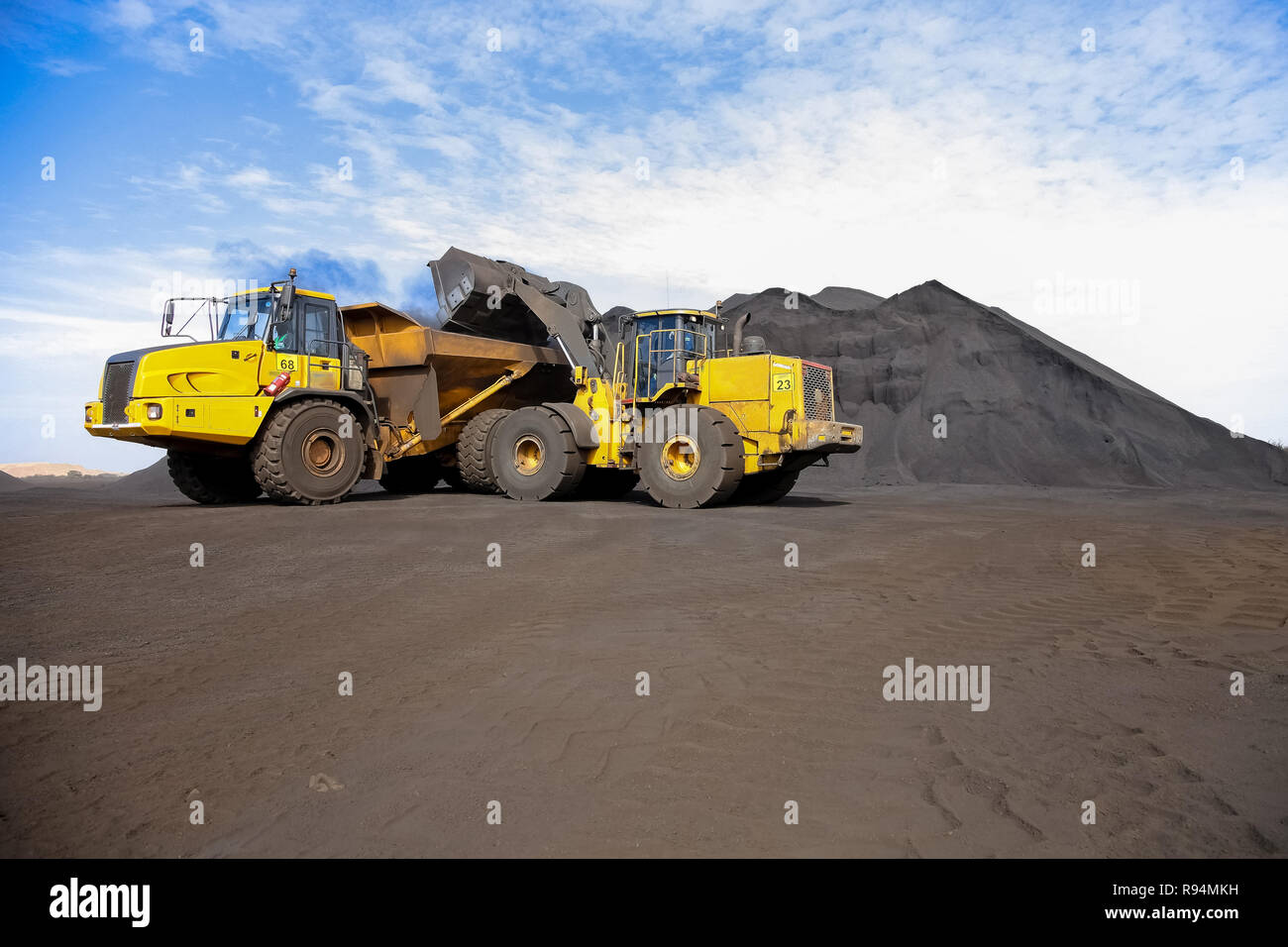 Mining Dump Truck transporting Manganese ore for processing and storage ...