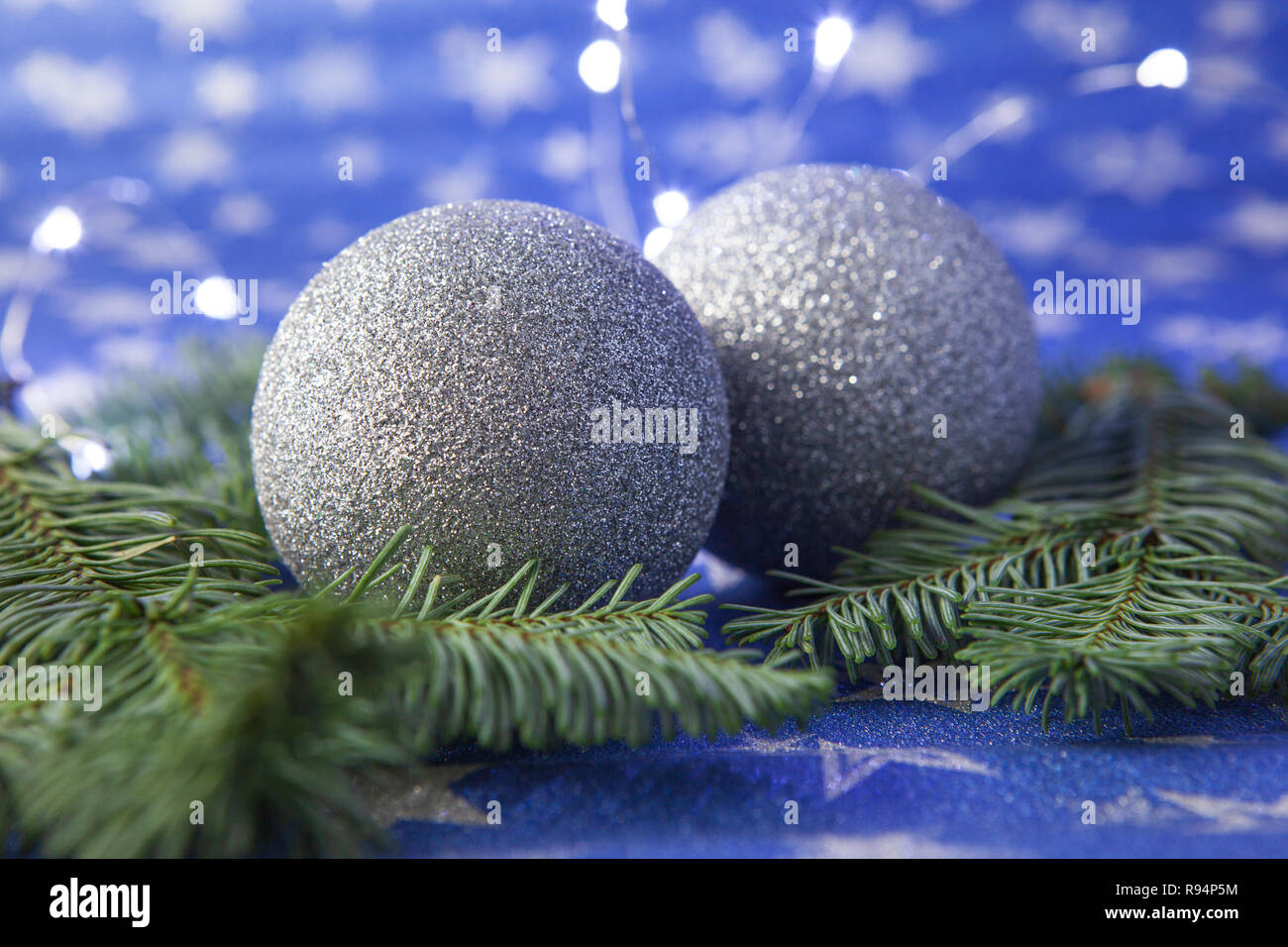 Balls for new year spruce on a blue background, close-up Stock Photo ...