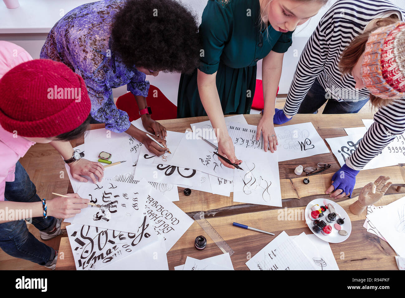 Four creative talented students of art department painting Stock Photo ...