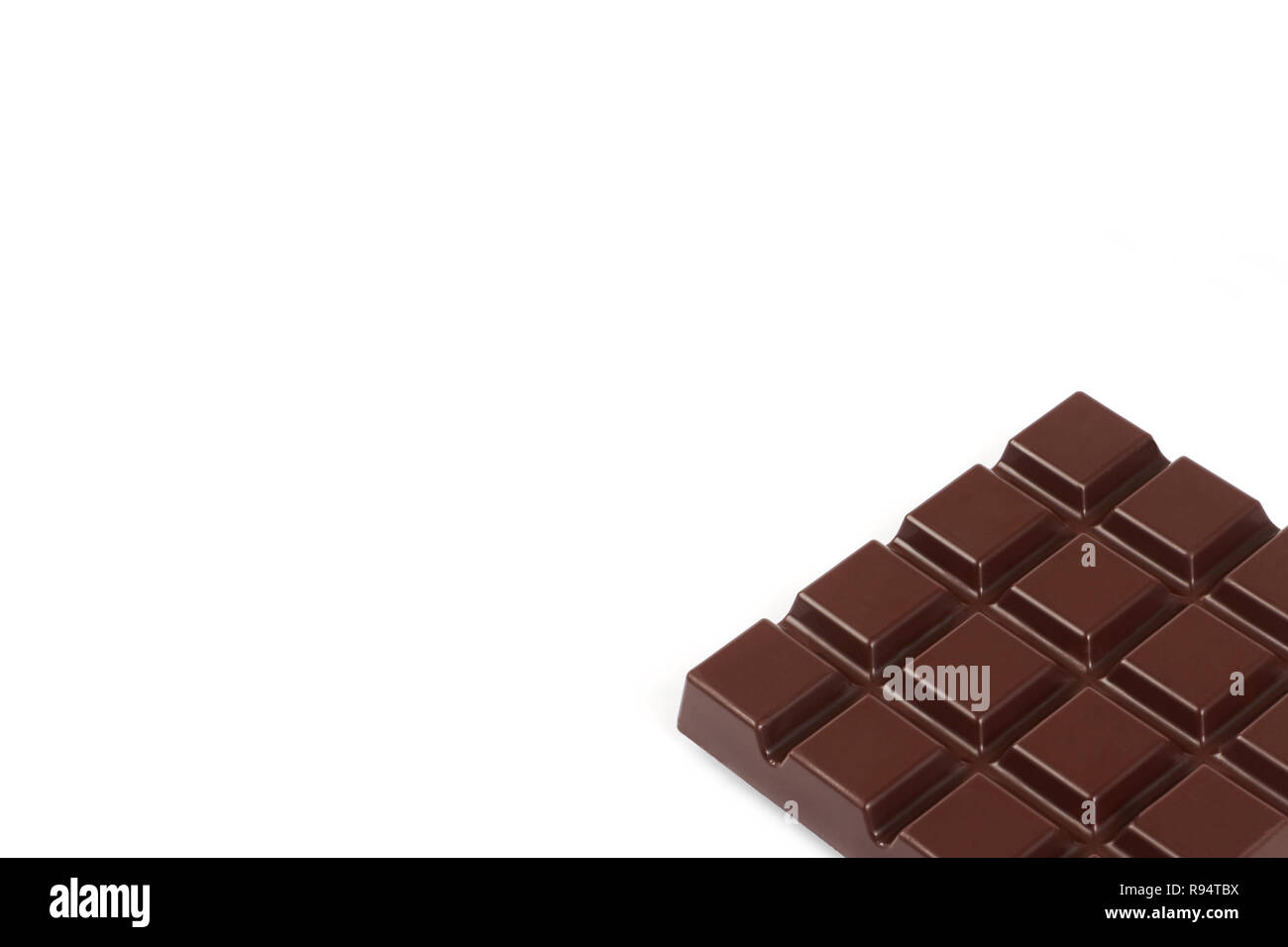Dark chocolate bar isolated on a white background Stock Photo - Alamy