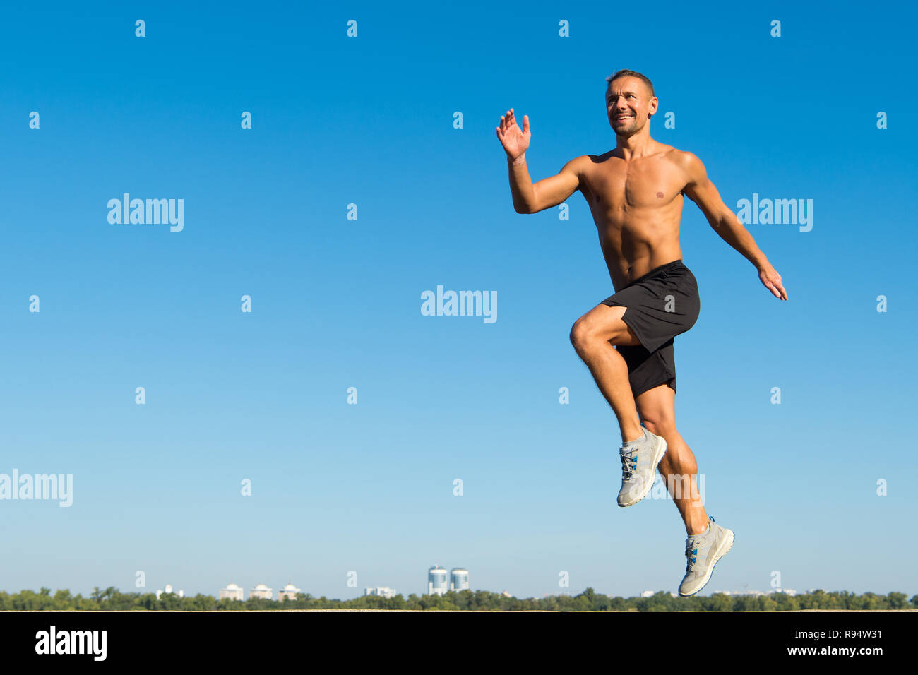 Man athlete muscular torso run. Morning run fills with energy ...