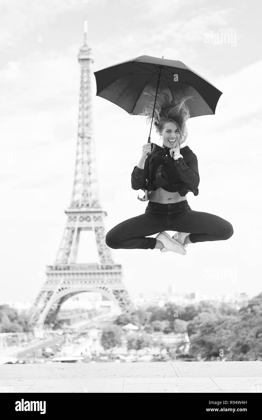 Dreams come true concept. Lady tourist sporty and active in Paris city ...
