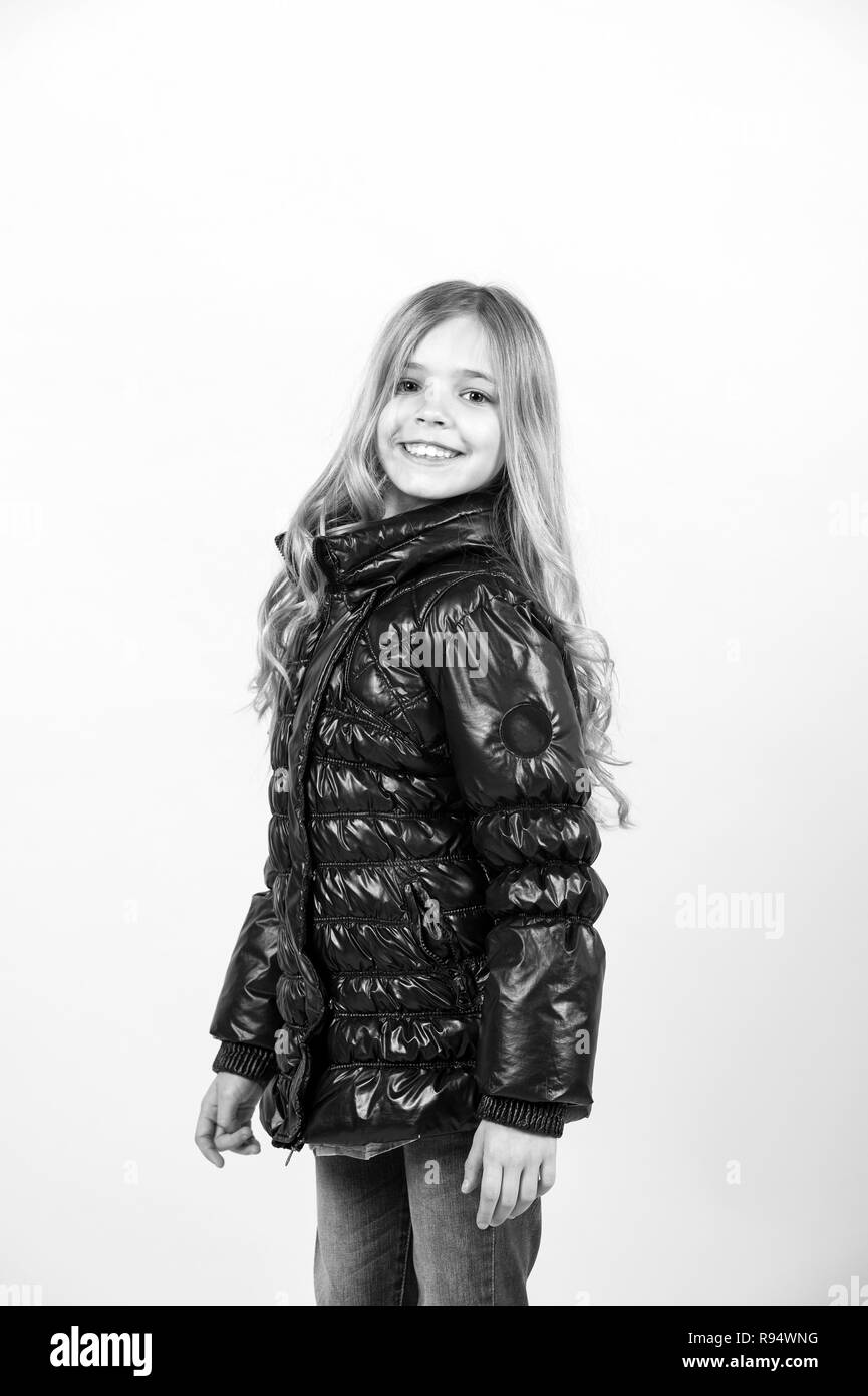 Happy childhood concept. Child model smile with long blond hair. Kid ...