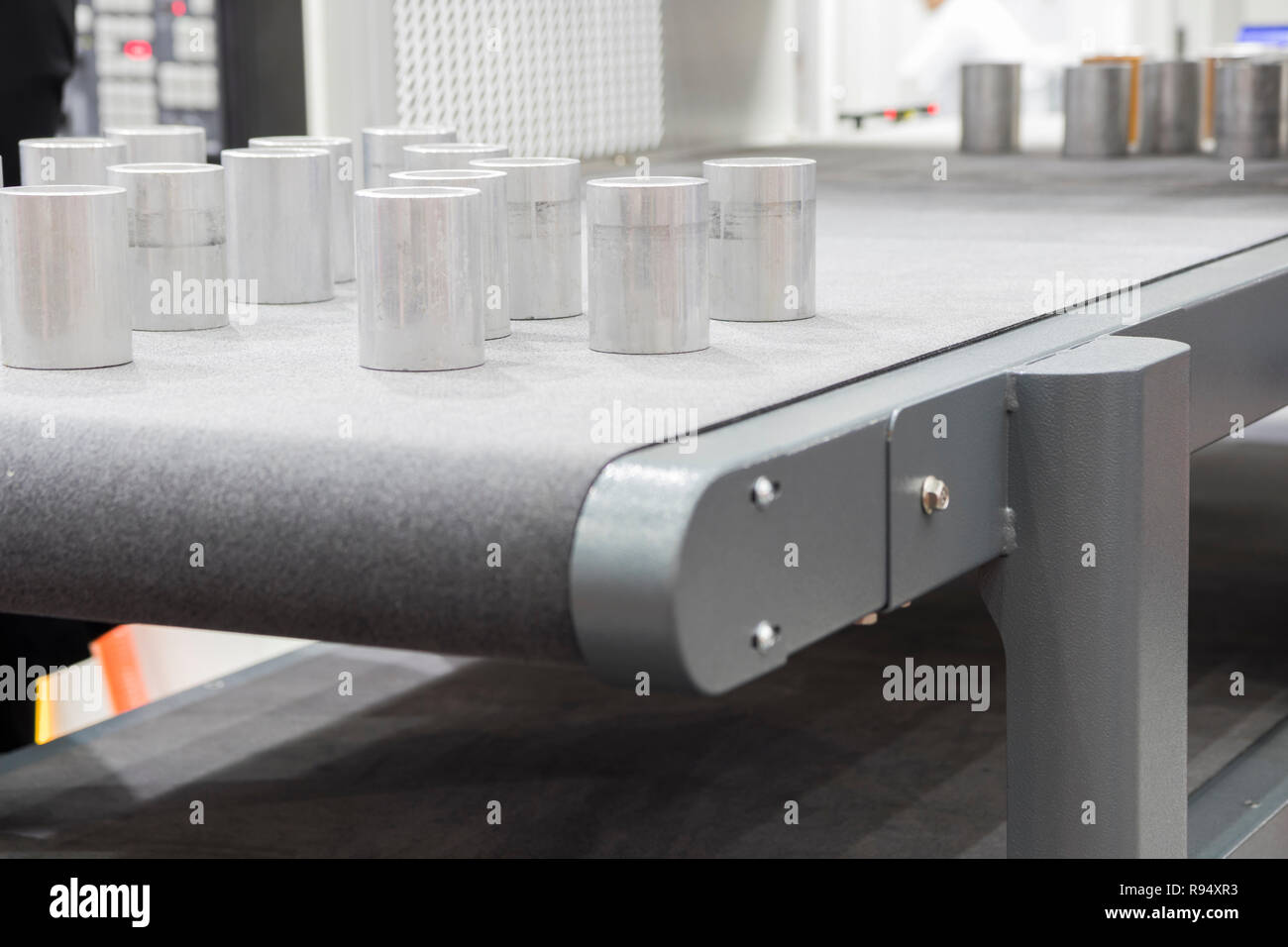 The machining metal parts in conveyor ; selective focus Stock Photo - Alamy
