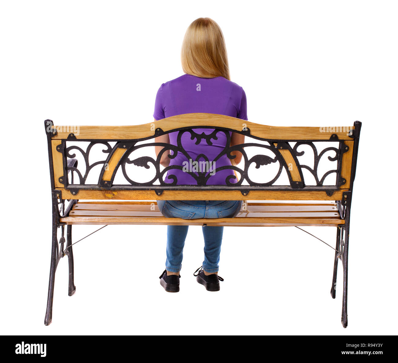 Back view of a woman sitting on a bench. girl watching. Rear view ...