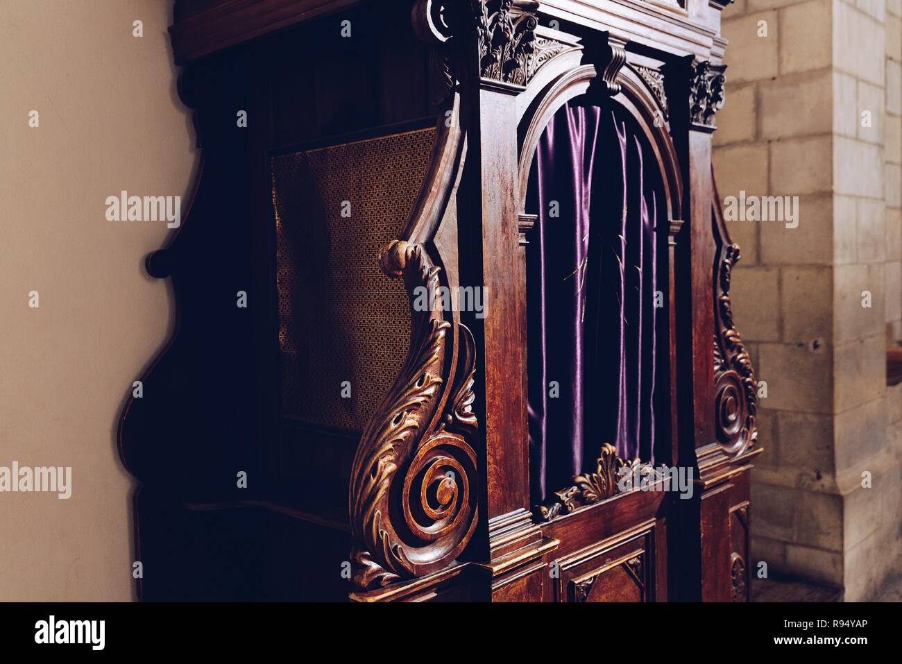Old brown wooden confessional in the catholic church Stock Photo - Alamy