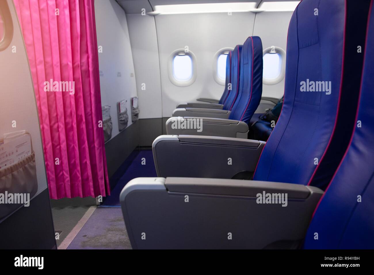 First row of seats in a passenger plane. Passenger plane interior ...
