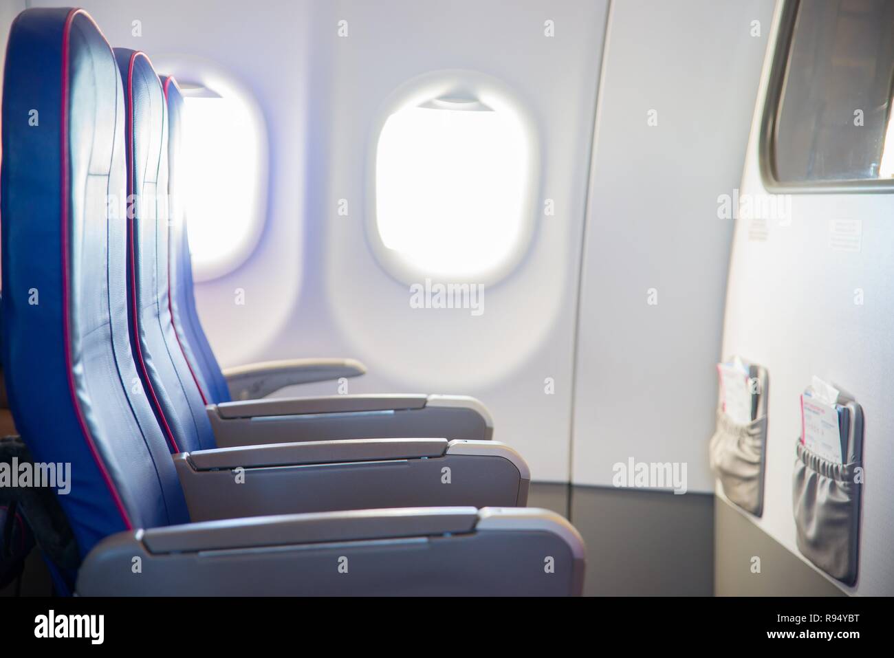 Empty seats in a passenger plane. Passenger plane interior, economy ...