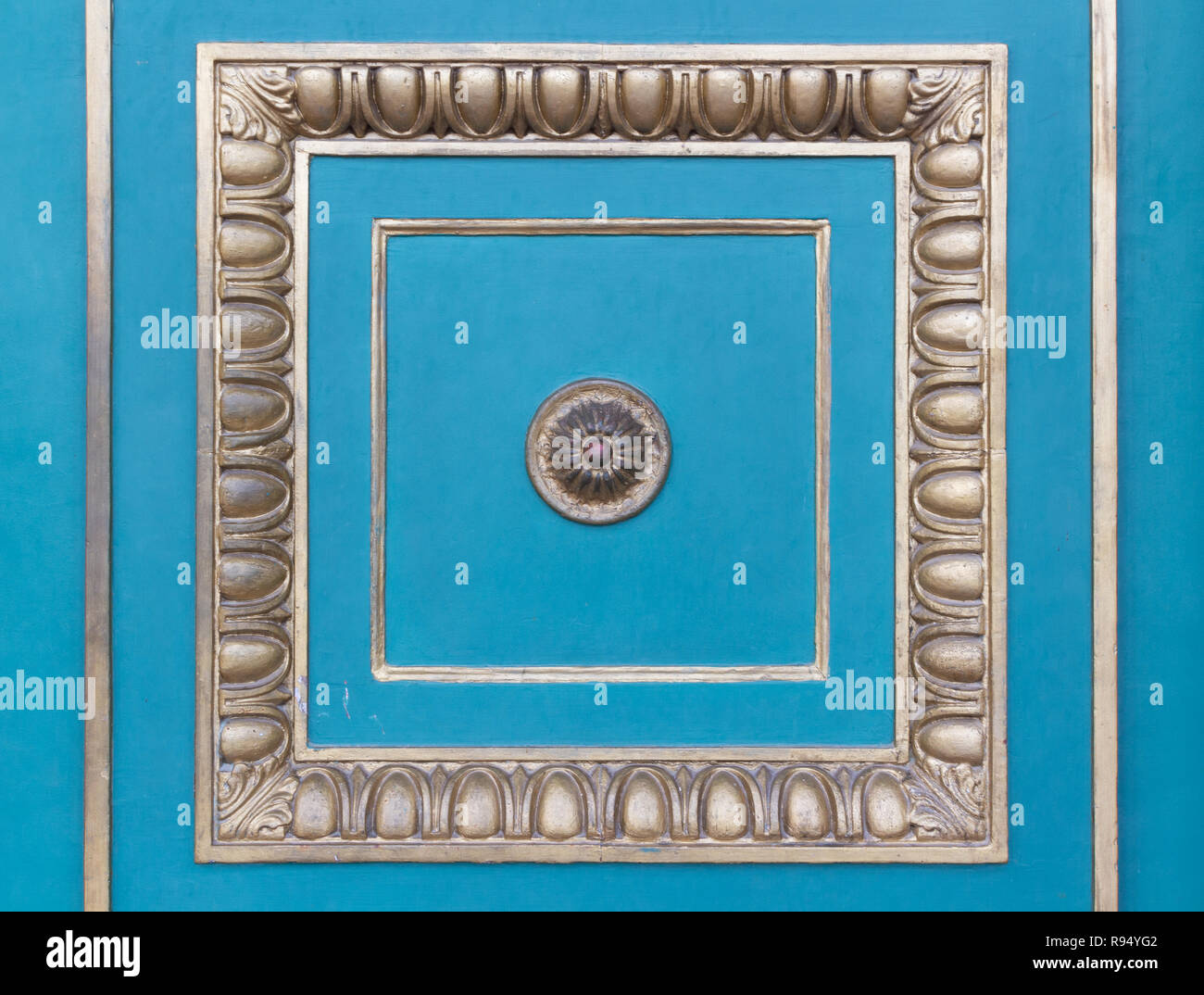 A square shaped ornament on the blue torquoise gate of the Cathedral of ...