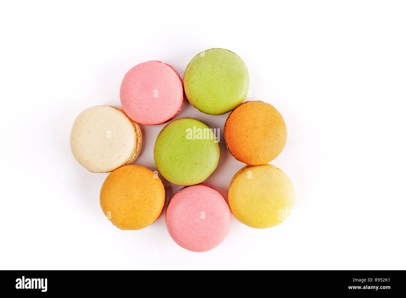 Top view of macarons in shape of flower isolated on white background ...