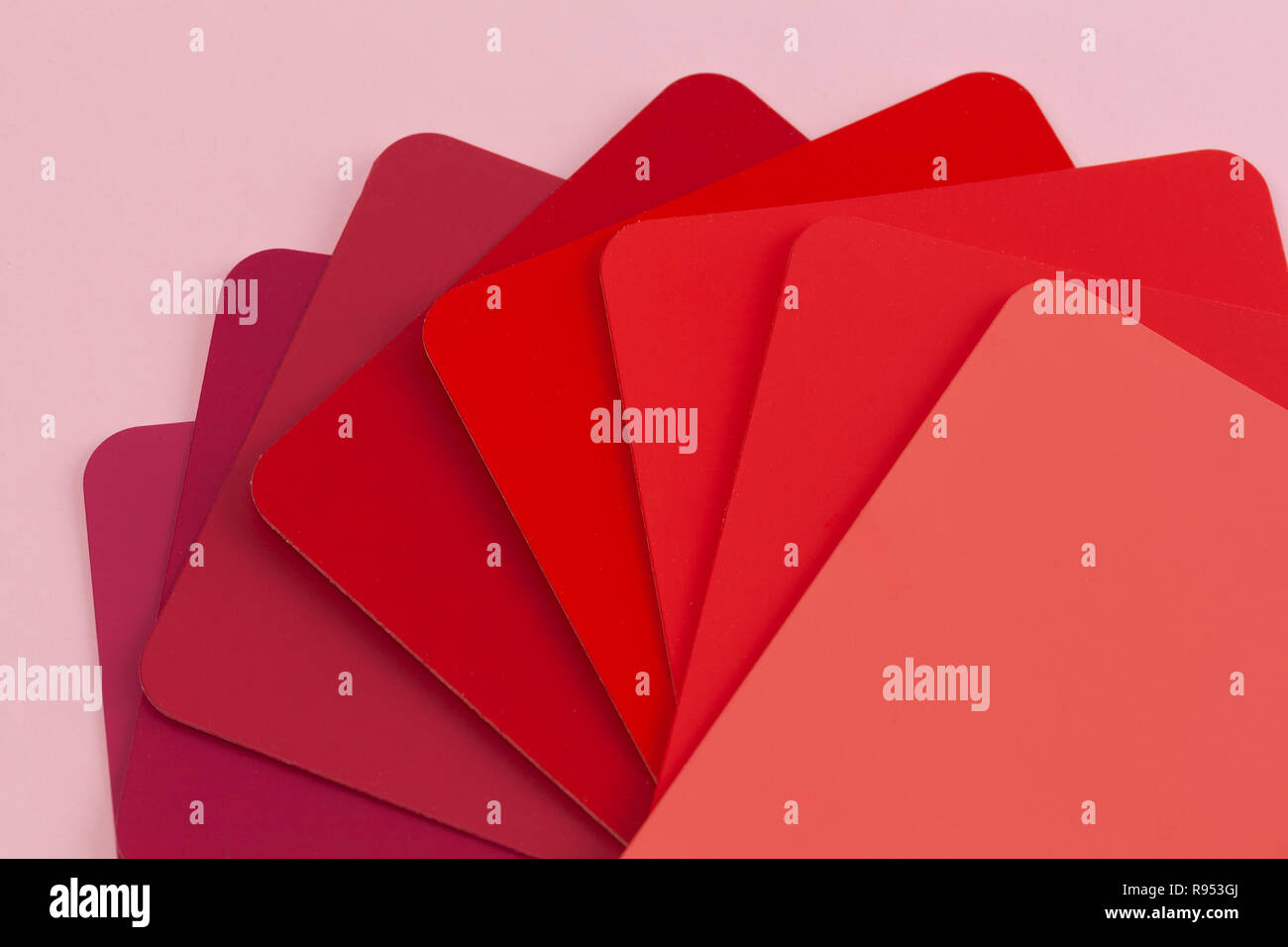 Paint color catalogue sample cards spread in fan shape - hues of red ...
