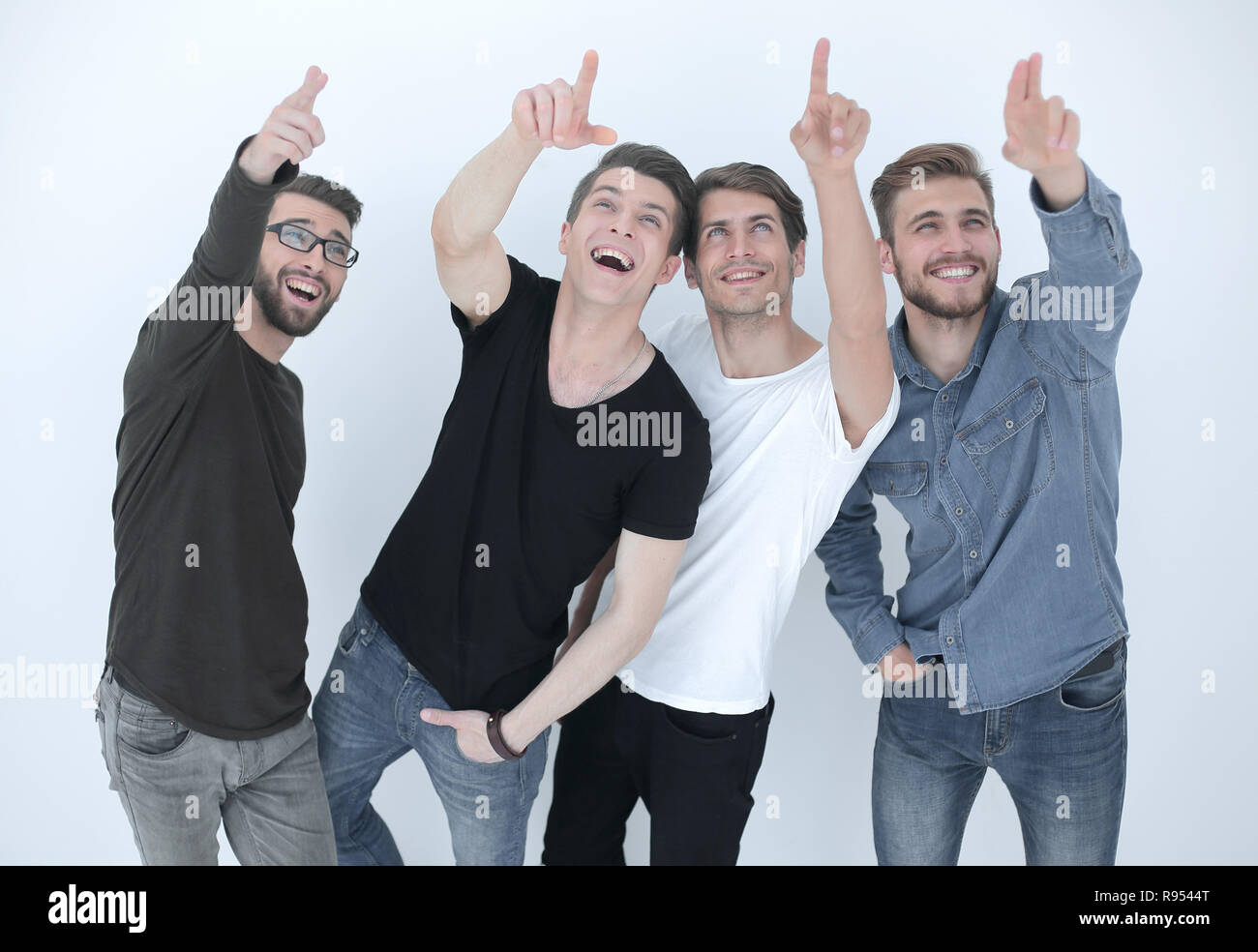 group of surprised young people looking and pointing up Stock Photo - Alamy