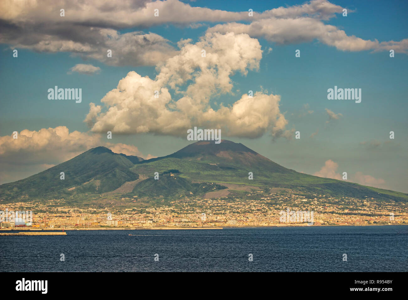 Naples, seen on posillipo and on the, semi covered by white clouds ...