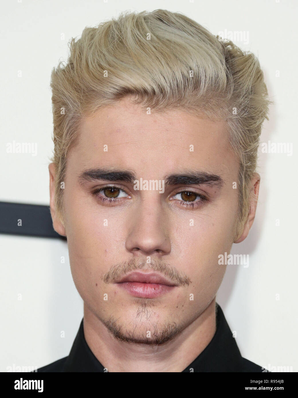 LOS ANGELES, CA, USA - FEBRUARY 15: Singer Justin Bieber arrives at the ...