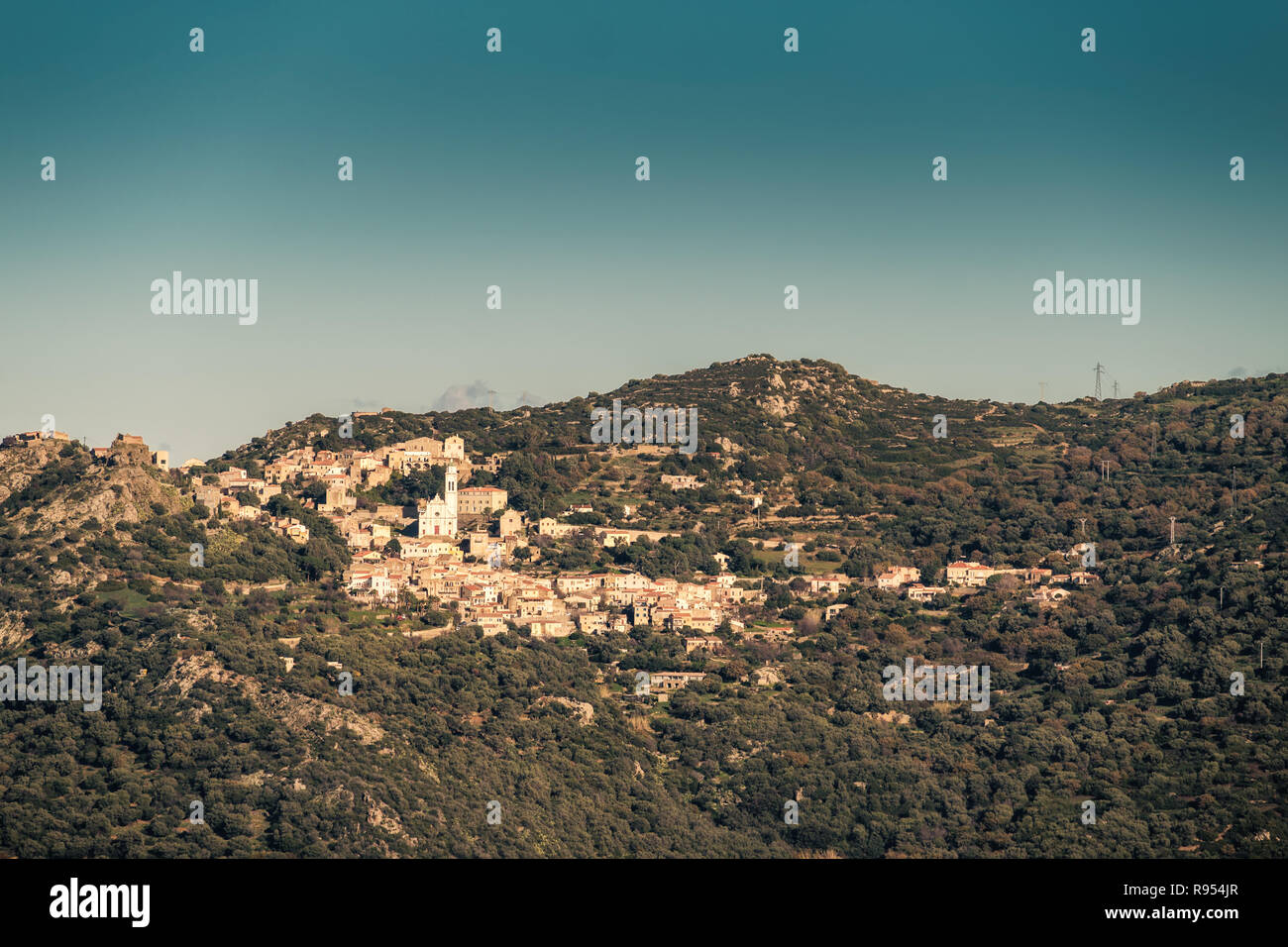 The ancient mountain village of Corbara lit by the evening sun in the ...