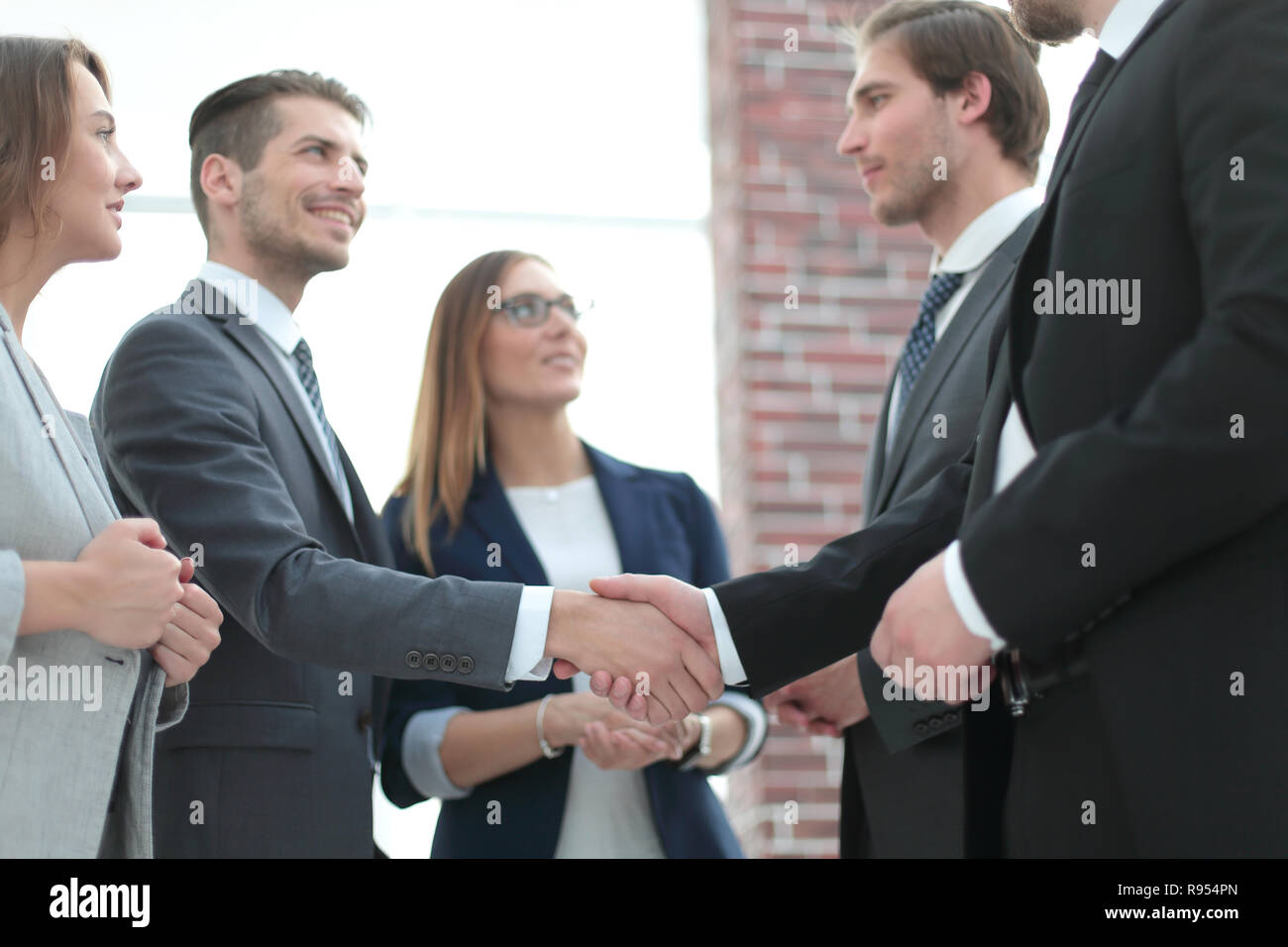 Group of people chatting in the office Stock Photo - Alamy