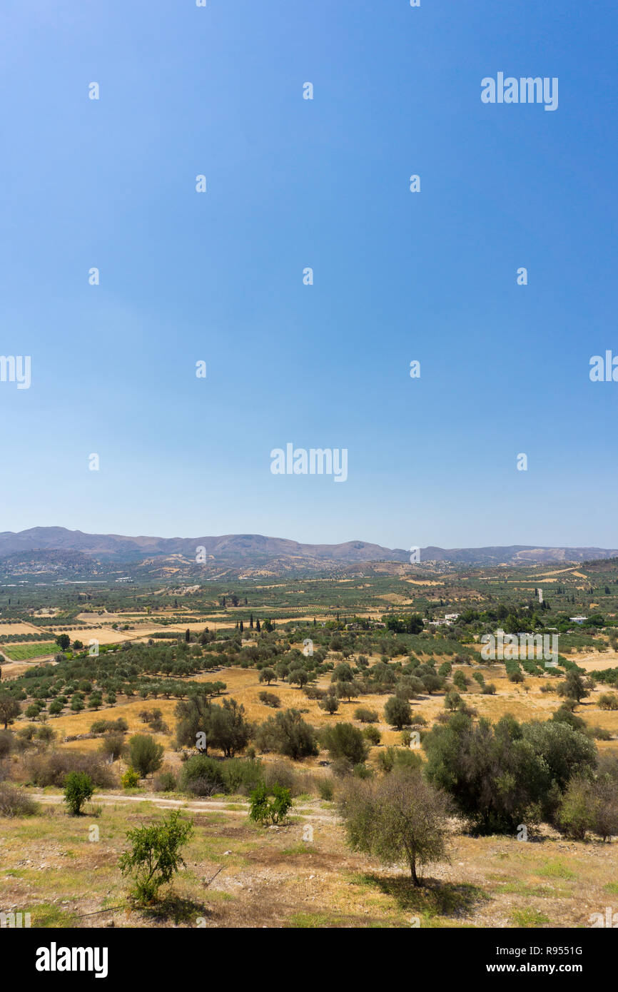 View of a dried Landscape with Mountains and Trees in Crete Stock Photo ...