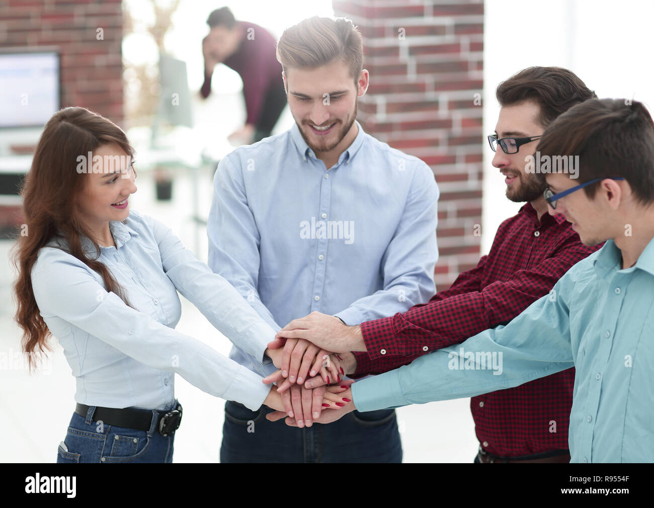 Group of people hands together partnership teamwork Stock Photo - Alamy