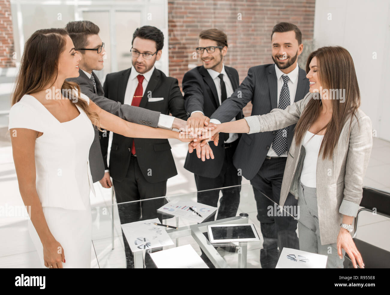 professional business team showing their unity Stock Photo - Alamy