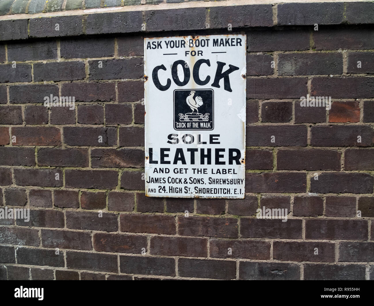 Advertising sign for boots made with leather Stock Photo - Alamy